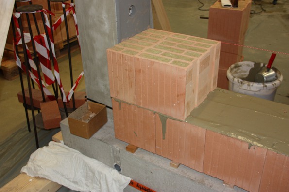 Design of reinforced concrete enclosures infilled with clay block ...