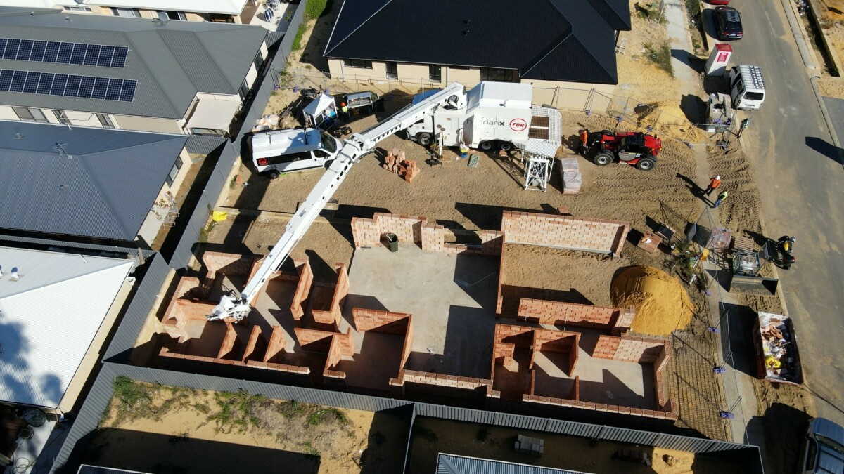 Automated wall construction - Hadrian X construction robot erects walls ...